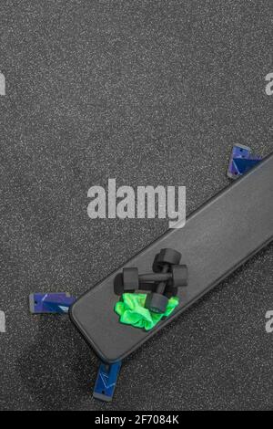Aerial view of weight bench and dumbbells in gym Stock Photo - Alamy