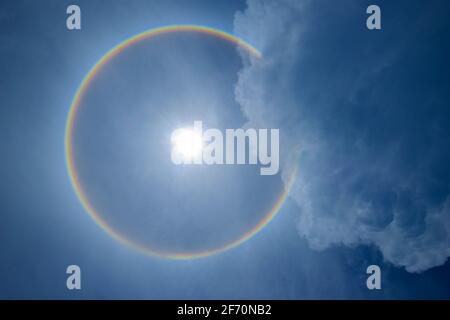A solar halo or sundog in a Filipino sky. The Philippines Stock Photo ...