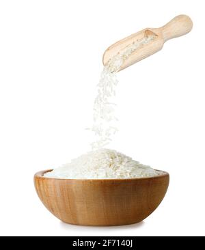 Thai jasmine rice, uncooked rice in wood spoon on wooden background ...