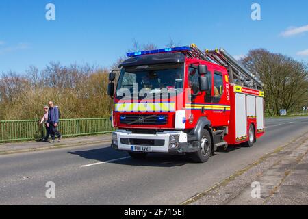 UK firefighting crew with fire engine Stock Photo - Alamy