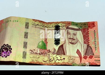 100 one hundred Saudi Arabia money roll riyals banknotes isolated on ...
