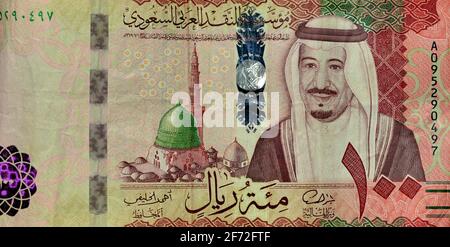 100 one hundred Saudi Arabia money roll riyals banknotes isolated on ...