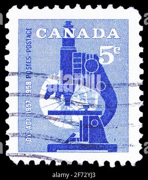 CANADA - CIRCA 1958: stamp printed by Canada, shows Kerosene Lamp and ...
