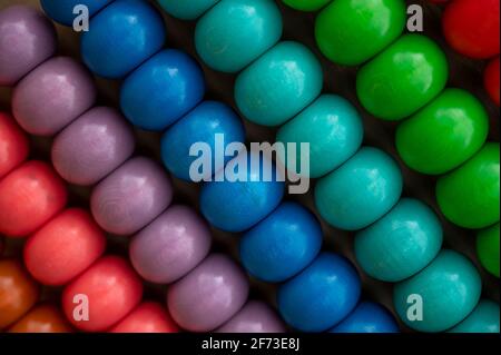 Abacus with Red and White Beads with a vibrant colored Background Stock ...