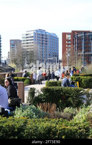 People walking on Bagley Walk an elevated park built on an old railway ...