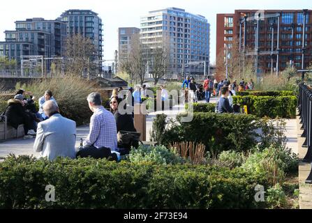 People walking on Bagley Walk an elevated park built on an old railway ...