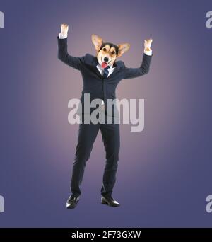 Dancing man with head of dog on blue background Stock Photo - Alamy