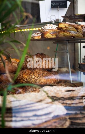 Flatbread and pastries in rustic display Stock Photo - Alamy