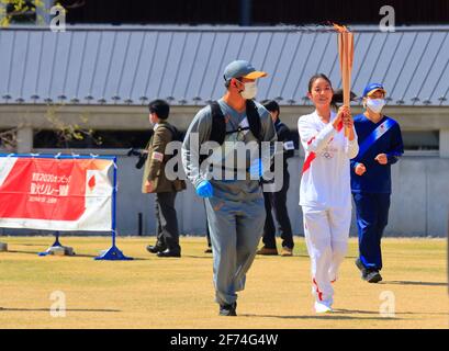 Local torchbearer, Eri Hayashi runs during the Tokyo 2020 Olympic torch ...