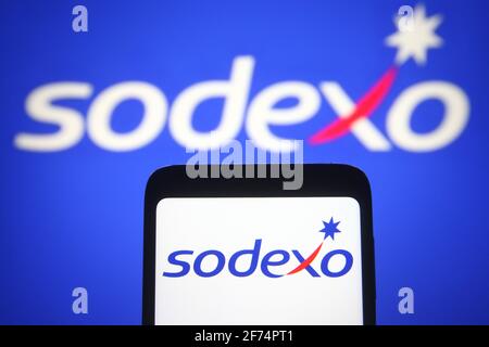 In this photo illustration, the Sodexo logo is seen displayed on a ...