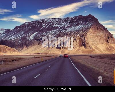 Car riding towards mountains in Iceland in winter Stock Photo - Alamy