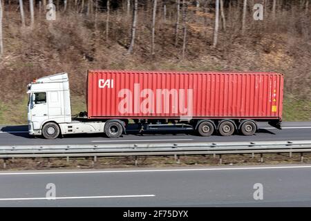 DAF XF truck with CAI container on motorway Stock Photo - Alamy