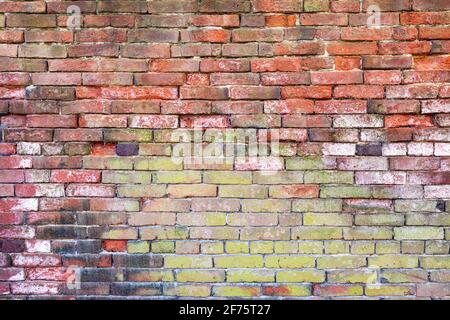 Old red brick wall showing frost damage / weathering resulting in ...
