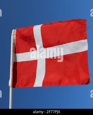 flag of Denmark over blue sky Stock Photo - Alamy
