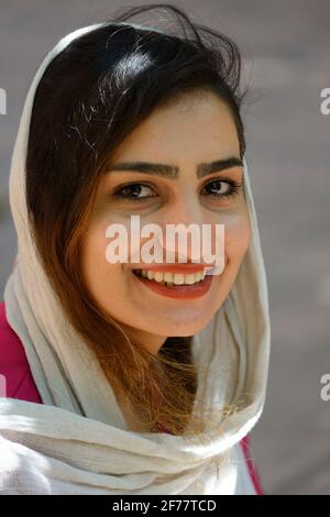 Young middle east woman smiling confident holding draw at art studio ...