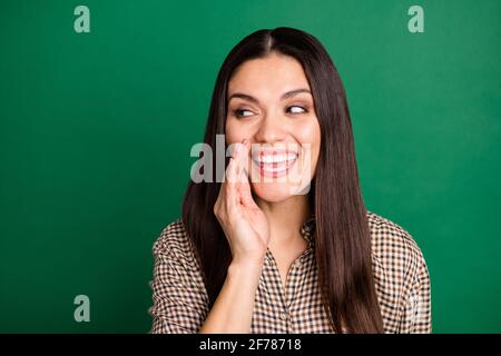 Photo of charming pretty lady palm hold empty space white smile wear ...