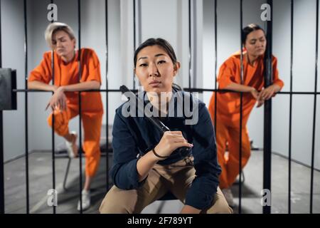 Asian women's prison. In the cell there are two young girls convicted ...