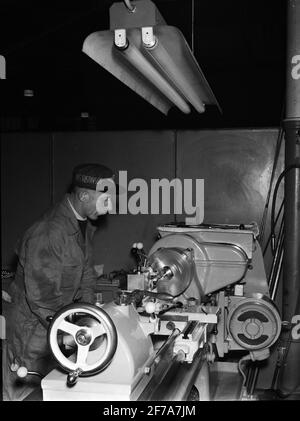 man operating a lathe Stock Photo - Alamy