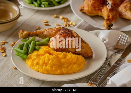 chicken with pumkin puree Stock Photo - Alamy