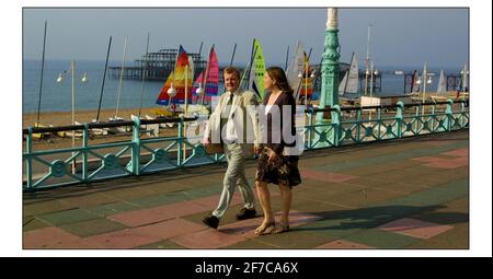 Charles and Sarah Kennedy walk down the beach front in Brighton ahead ...