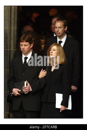 Gaynor Cook with robin cooks son Chris at Robin Cook's Funeral at St ...