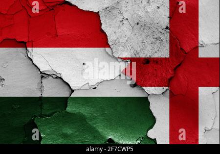 Flags of England and Hungary painted on cracked wall Stock Photo - Alamy