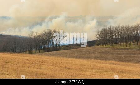 Smoke from controlled prairie fires fill the sky near Belvue, Kan ...