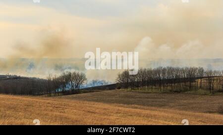 Smoke from controlled prairie fires fill the sky near Belvue, Kan ...