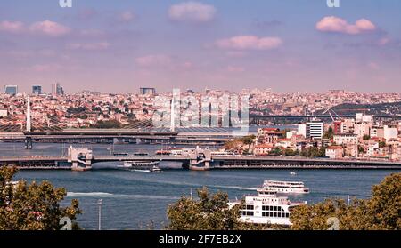 Beautiful Galata and Ataturk bridges with a cityscape and water with ...