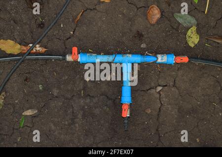 Three way joint of the PVC pipe. Potable water delivery system under ...
