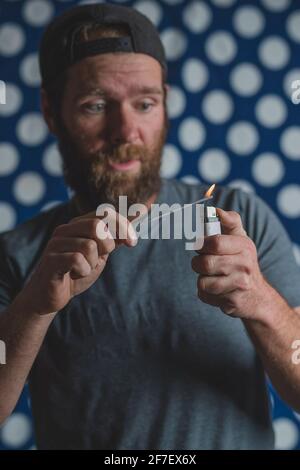 handsome hipster man with beard trying vr glasses at modern home Stock ...