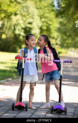 Happy children playing outdoors Stock Photo - Alamy