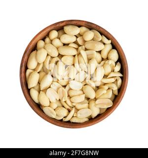 Peeled peanuts on a white wooden background Stock Photo - Alamy