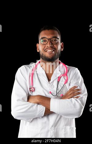dark skin doctor with pink stethoscope on a black background Stock ...
