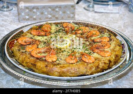 Fresh baked traditional Moroccan fish pastilla close up Stock Photo - Alamy
