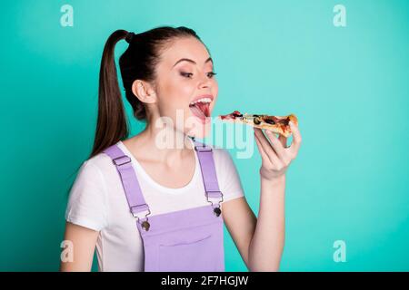 Side profile photo portrait of hungry girl with tails eating tasty ...