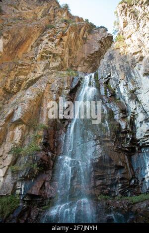 Waterfall among steep cliffs Stock Photo - Alamy