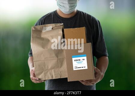 delivery medical box of vaccines from courier man receive package from ...
