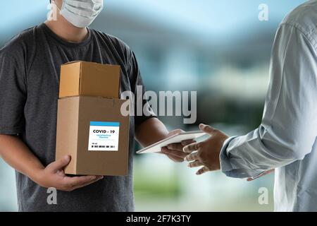 delivery medical box of vaccines from courier man receive package from ...