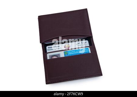 Qatari ID Card and Health Hard in Leather Valet on Isolated Background ...