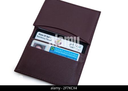 Qatari ID Card and Health Hard in Leather Valet on Isolated Background ...
