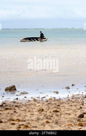 Traditional fisherman sailing boat turned to the side in the sea ...