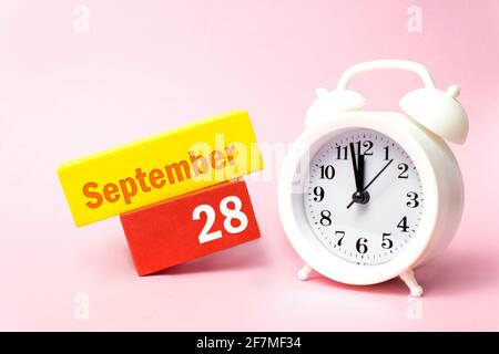 September 28th. Day 28 of month, Calendar date. Yellow sheet of the ...