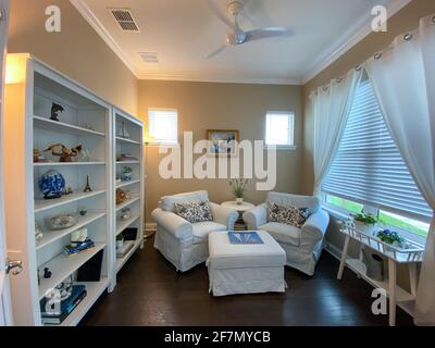 A nicely decorated cozy den in a home that is perfect for reading Stock ...