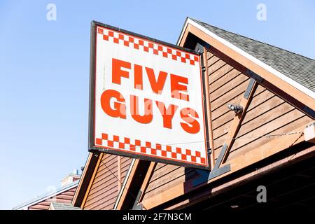 Five Guys sign at a Five Guys Fast food restaurant in Munich town ...