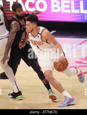 Phoenix Suns' Devin Booker dribbles during the first half of an NBA ...