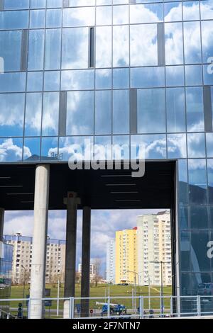 Architectural detail of the facade with multiple reflections of other ...