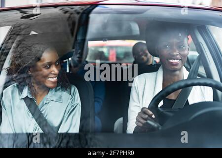 Carpool Ride Sharing. African People Using Car Share Stock Photo - Alamy
