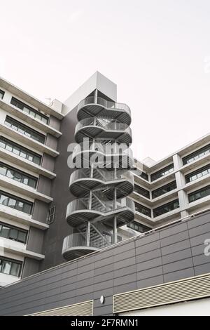 Modern concrete building with vertical design Stock Photo - Alamy