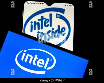 In this photo illustration an Intel Corporation logo seen displayed on ...